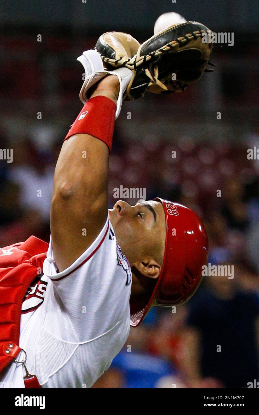 Cincinnati Reds catcher Brayan Pena catches a pop foul by Los Angeles ...