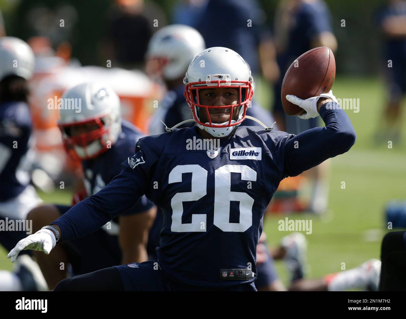New England Patriots cornerback Logan Ryan tosses the ball while ...