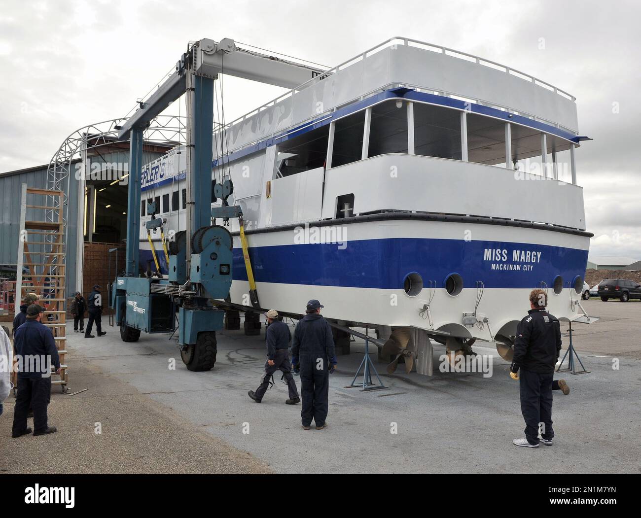 The Miss Margy, a new 85-foot, 68-ton passenger ferry, is lifted off ...