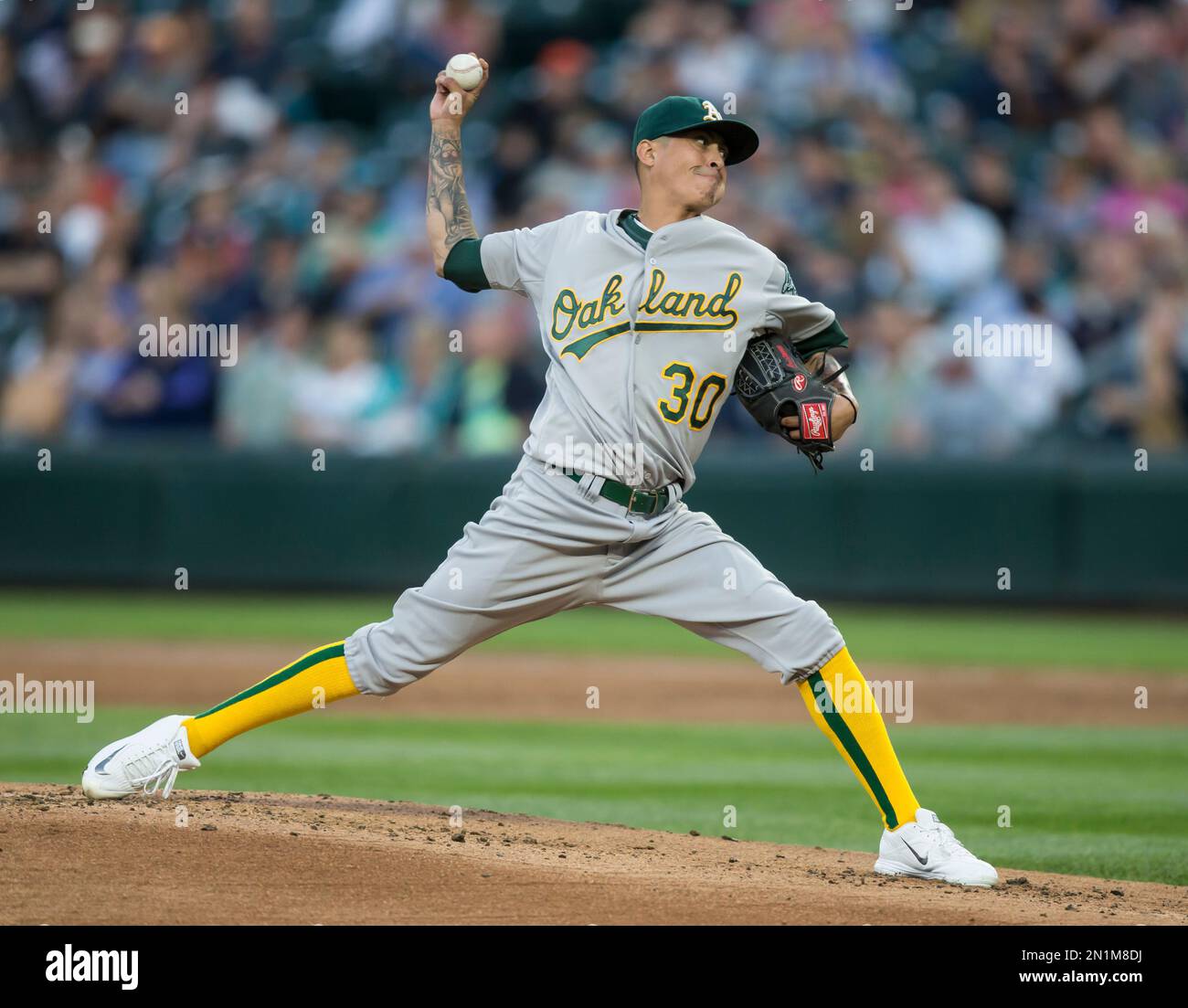 Oakland Athletics starter Jesse Chavez delivers a pitch during a ...
