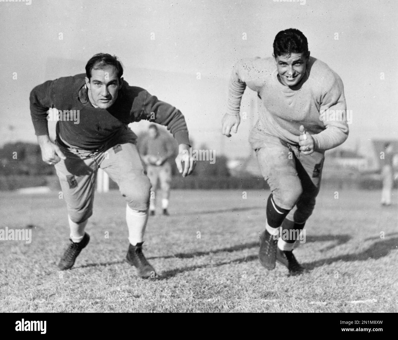 Tackles, Ernie Smith, left, and Capt. Raymond "Tay" Brown, of the ...