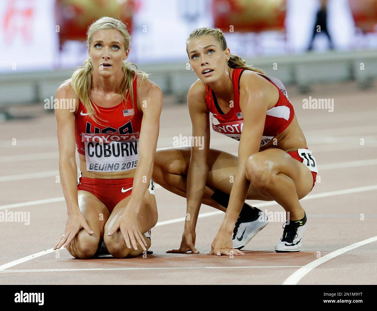 United States' Emma Coburn and compatriot Colleen Quigley look at the ...