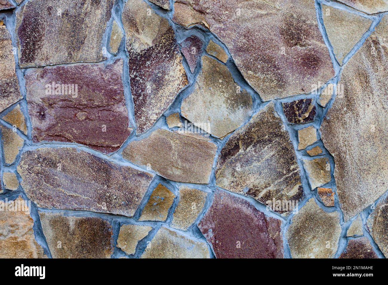 background in the form of stone tiles. stone tile wall. stone ...
