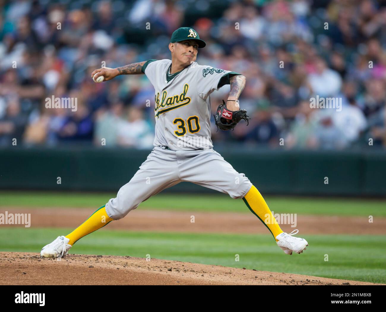 Oakland Athletics starter Jesse Chavez delivers a pitch during the ...