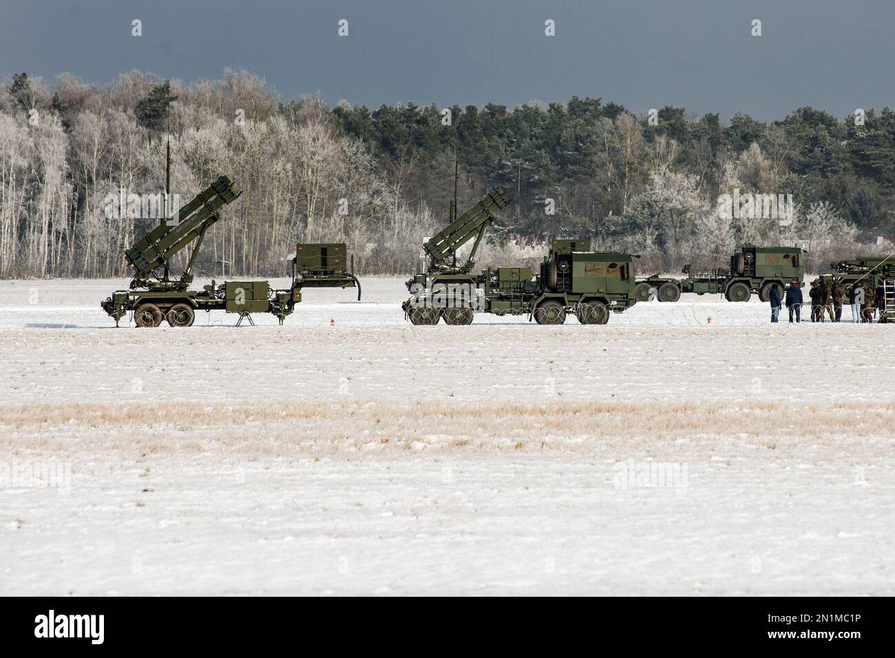 Patriot missile launchers pointing into the sky are seen located at ...