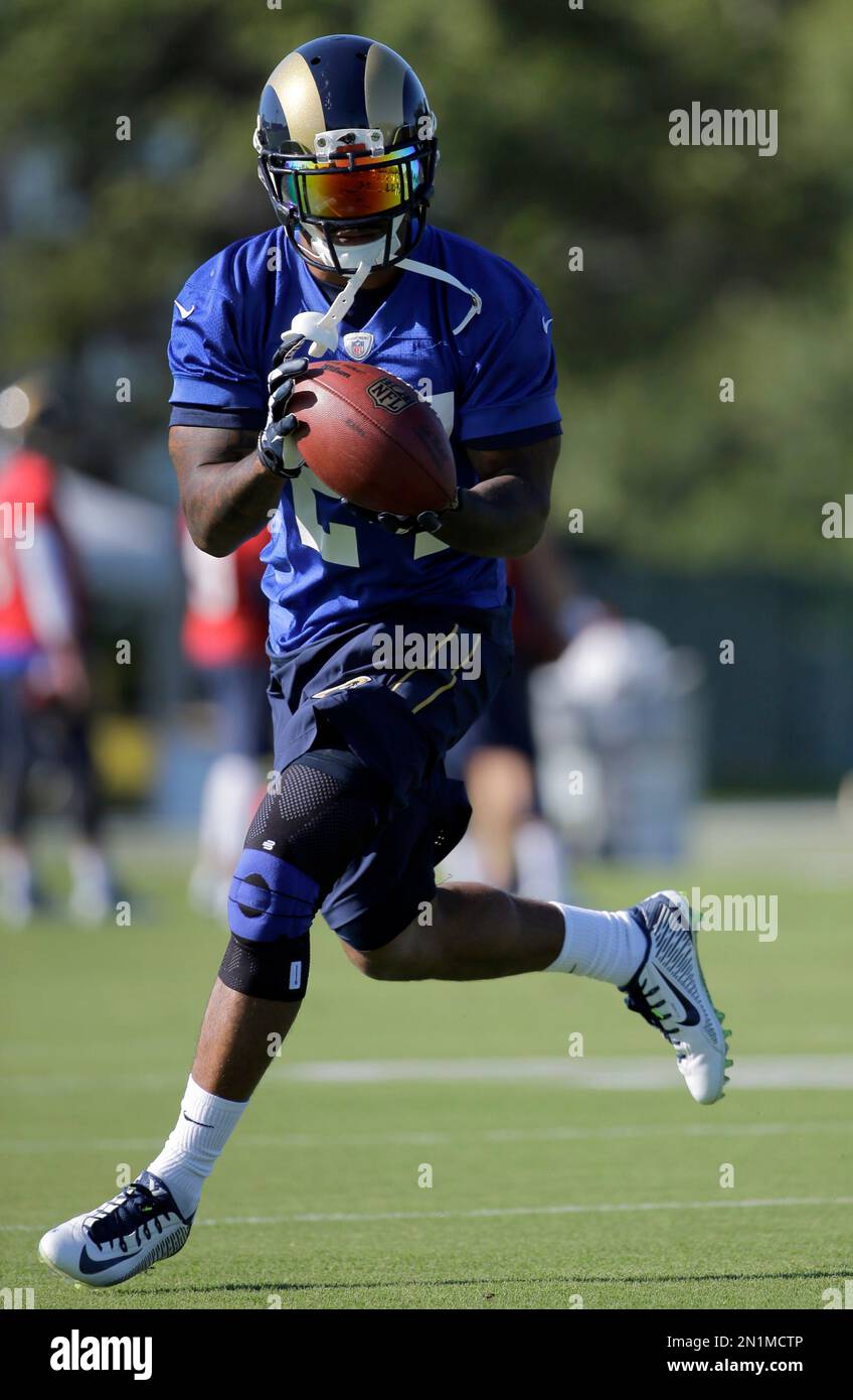 St. Louis Rams running back Isaiah Pead catches a ball during training ...