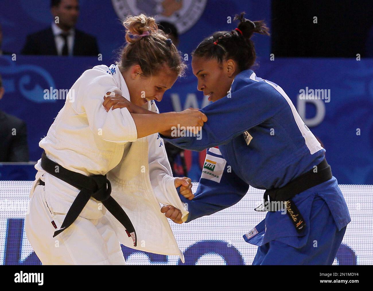Brazil's Erika Miranda, right, competes against Italy's Odette ...