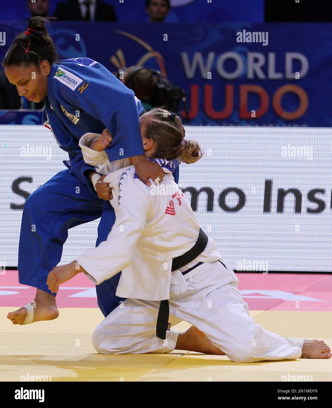 Brazil's Erika Miranda, left, competes against Italy's Odette Giuffrida ...