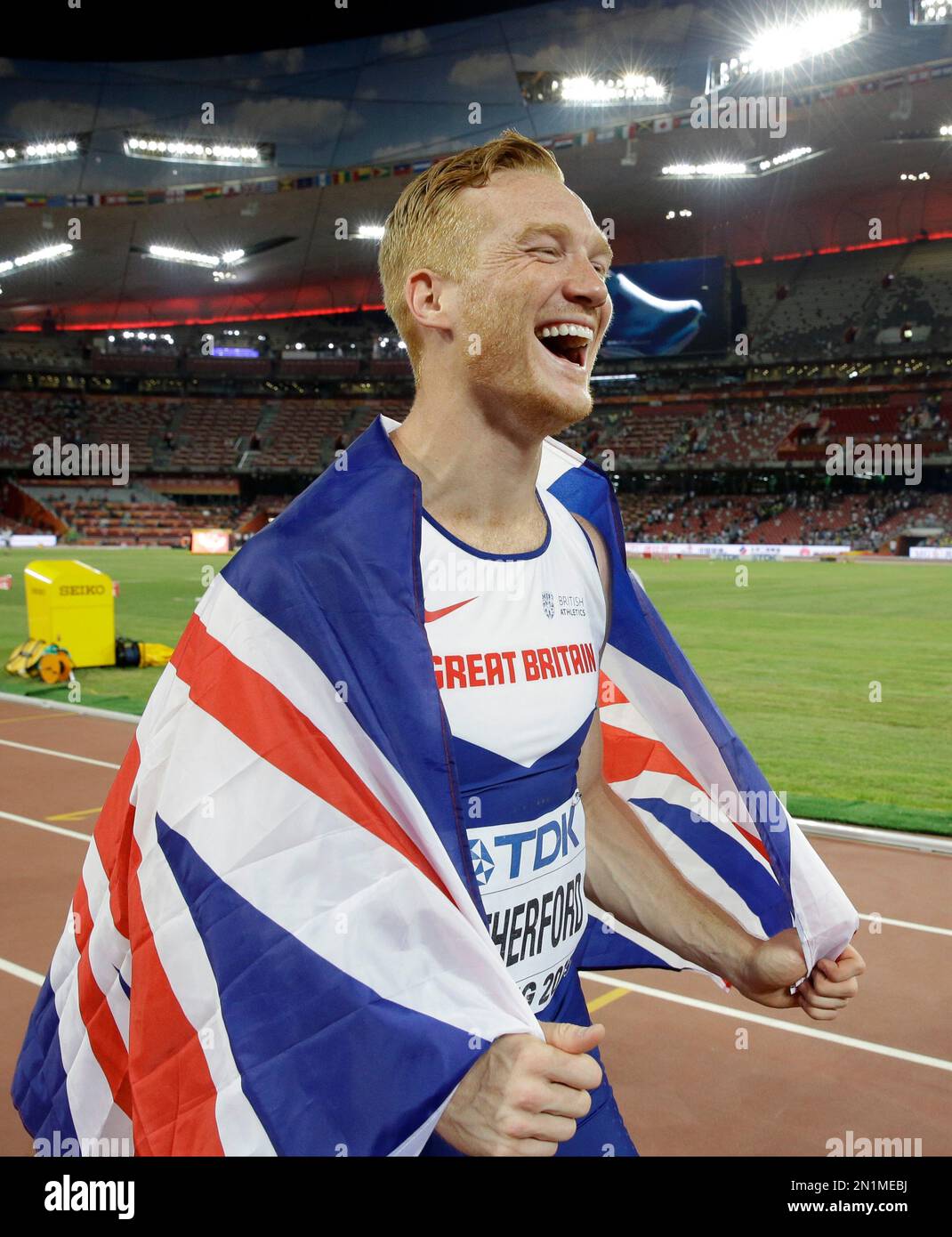 Britain's Greg Rutherford celebrates after winning the gold medal in ...