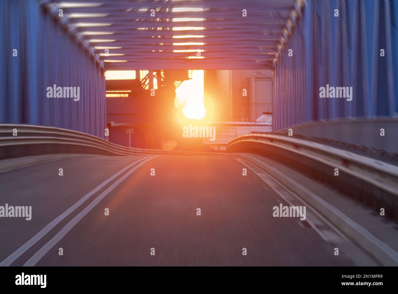 rising sun over the truss bridge Stock Photo - Alamy