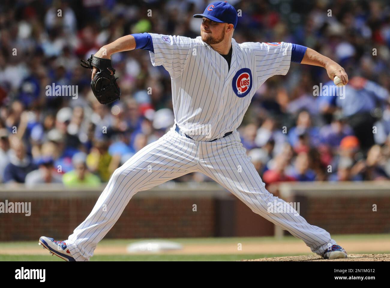 Chicago Cubs starting pitcher Jon Lester delivers during a baseball ...