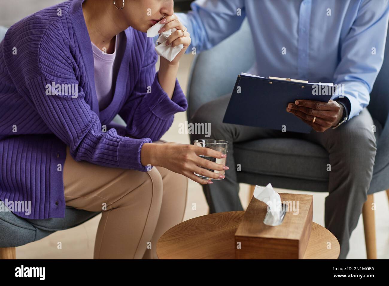 Young woman crying and talking about her anxiety when talking to ...