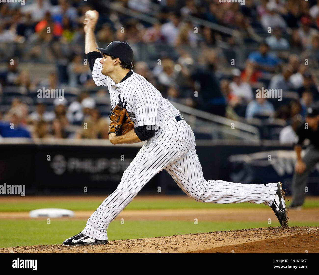 New York Yankees starting pitcher Nathan Eovaldi delivers the eighth ...