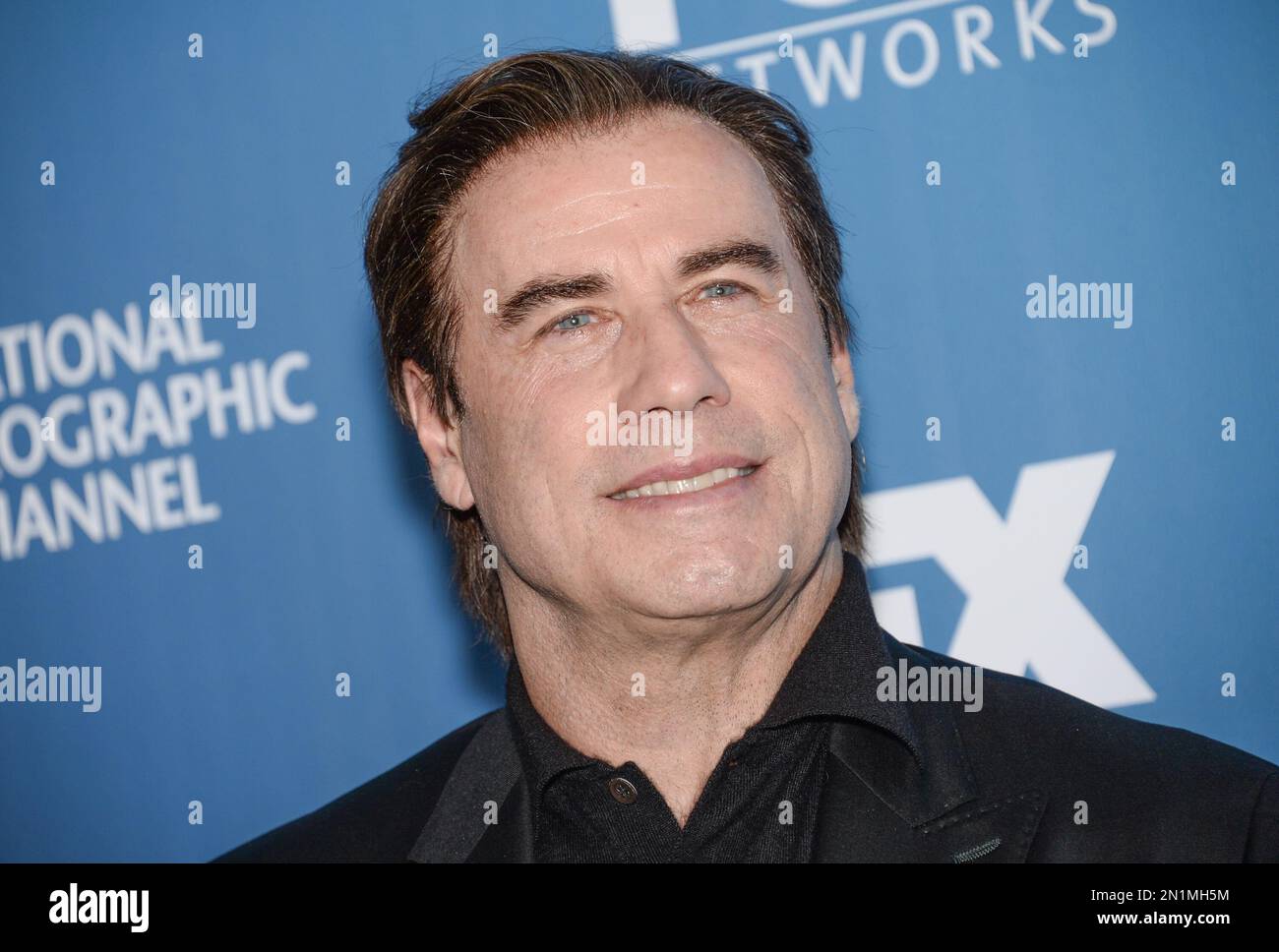 John Travolta arrives at the Fox Network 2015 Programming Upfront at ...