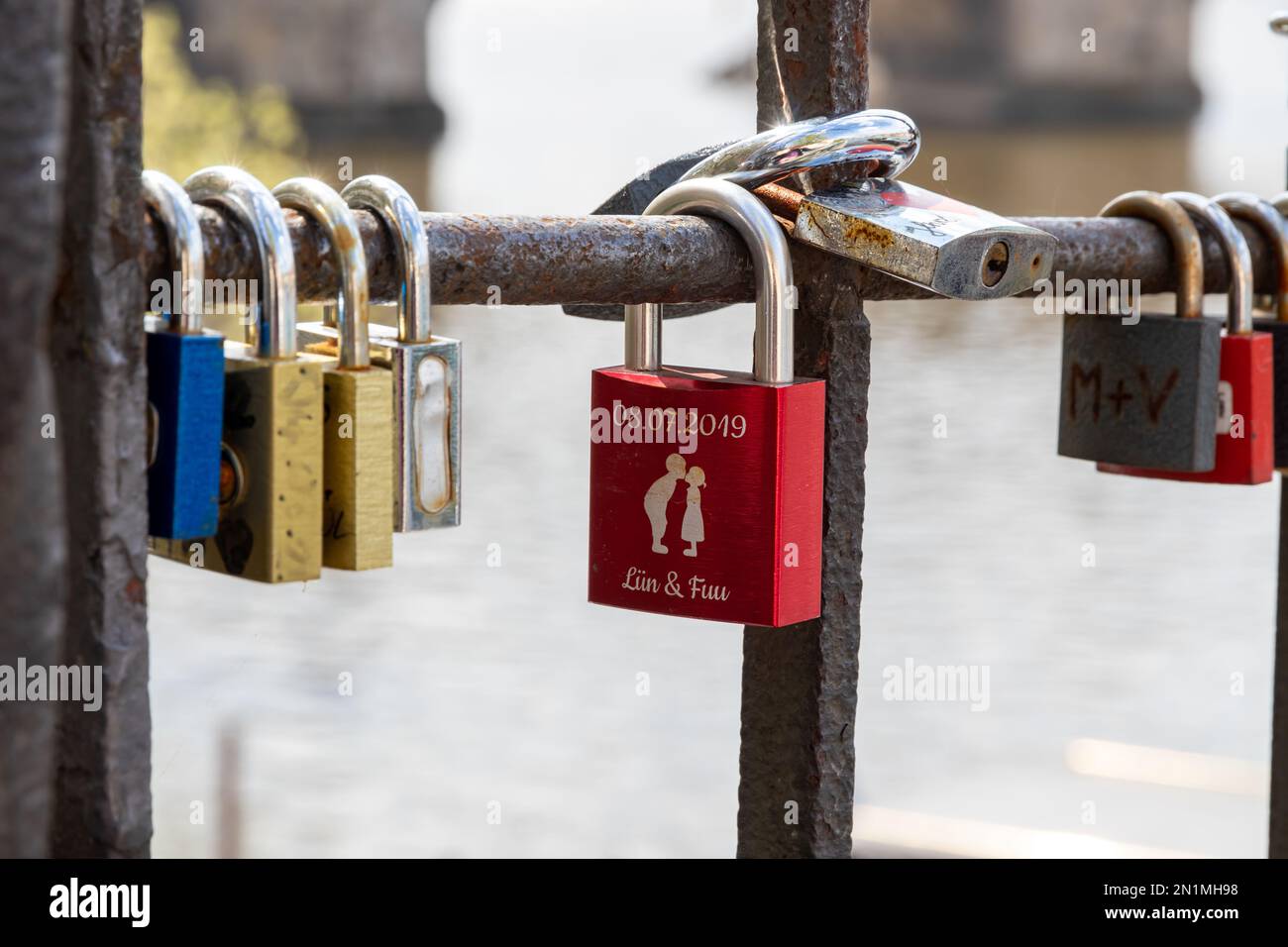 April 25, 2022 Prague Czech Republic. Colored metal padlocks on a fence ...