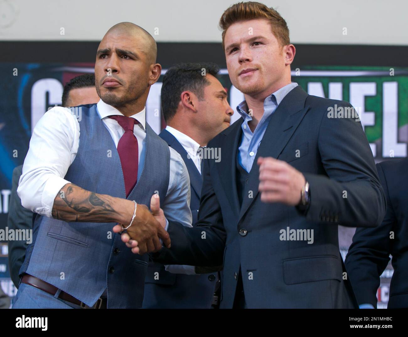 Boxers Miguel Cotto, from Puerto Rico, left, WBC, Ring Magazine and ...