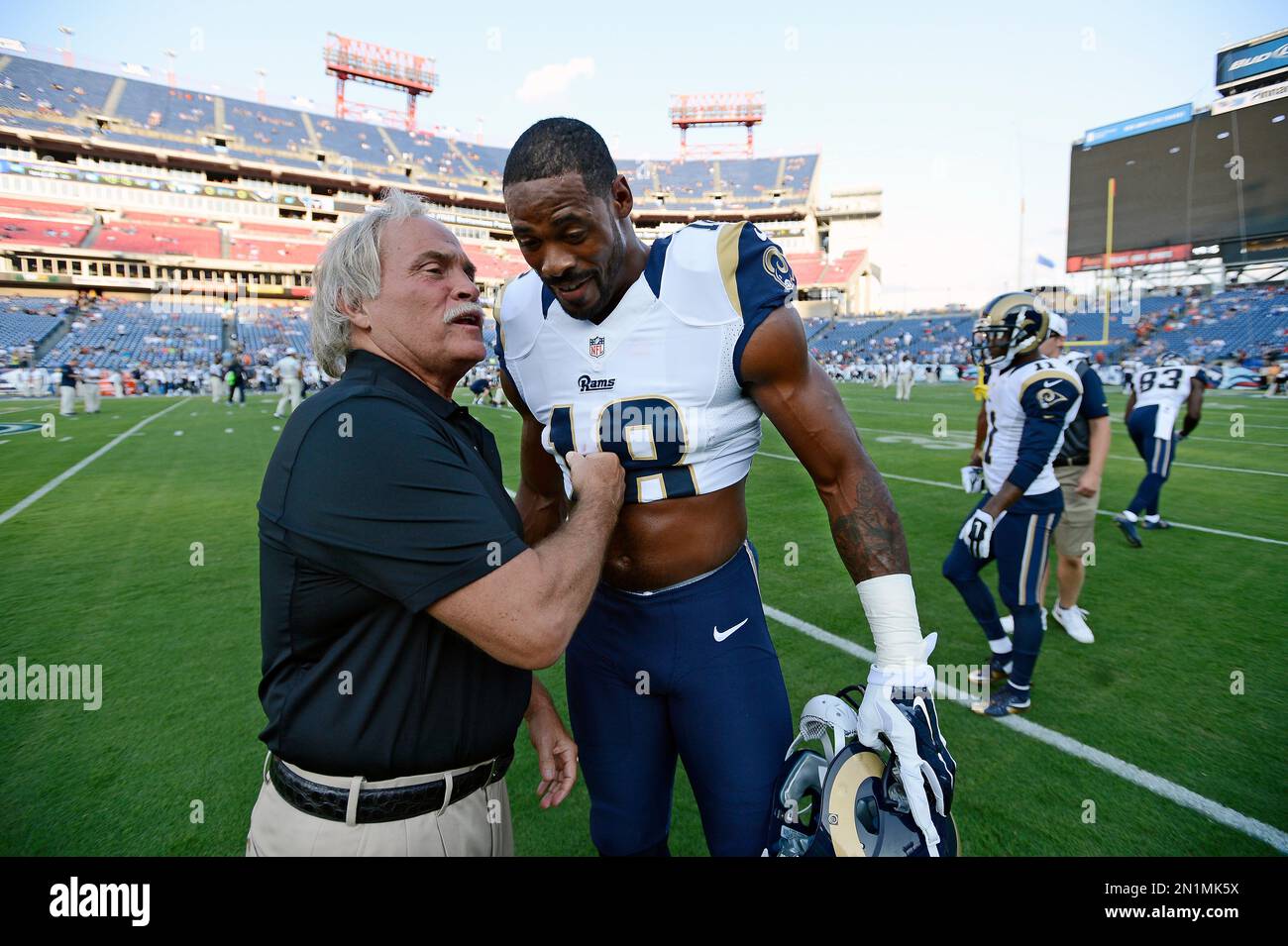 St. Louis Rams wide receiver Kenny Britt (18) talks with Tennessee ...