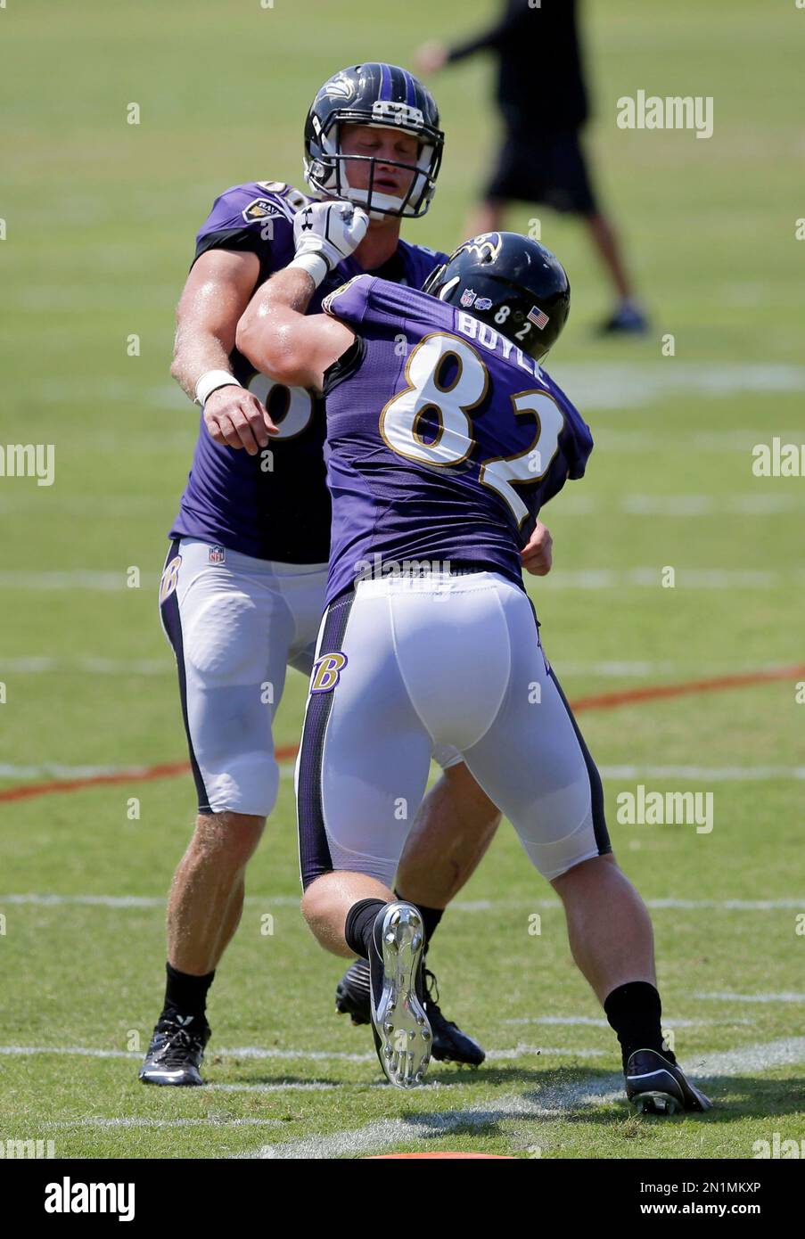 Baltimore Ravens tight end Nick Boyle (82) runs a drill with teammate ...