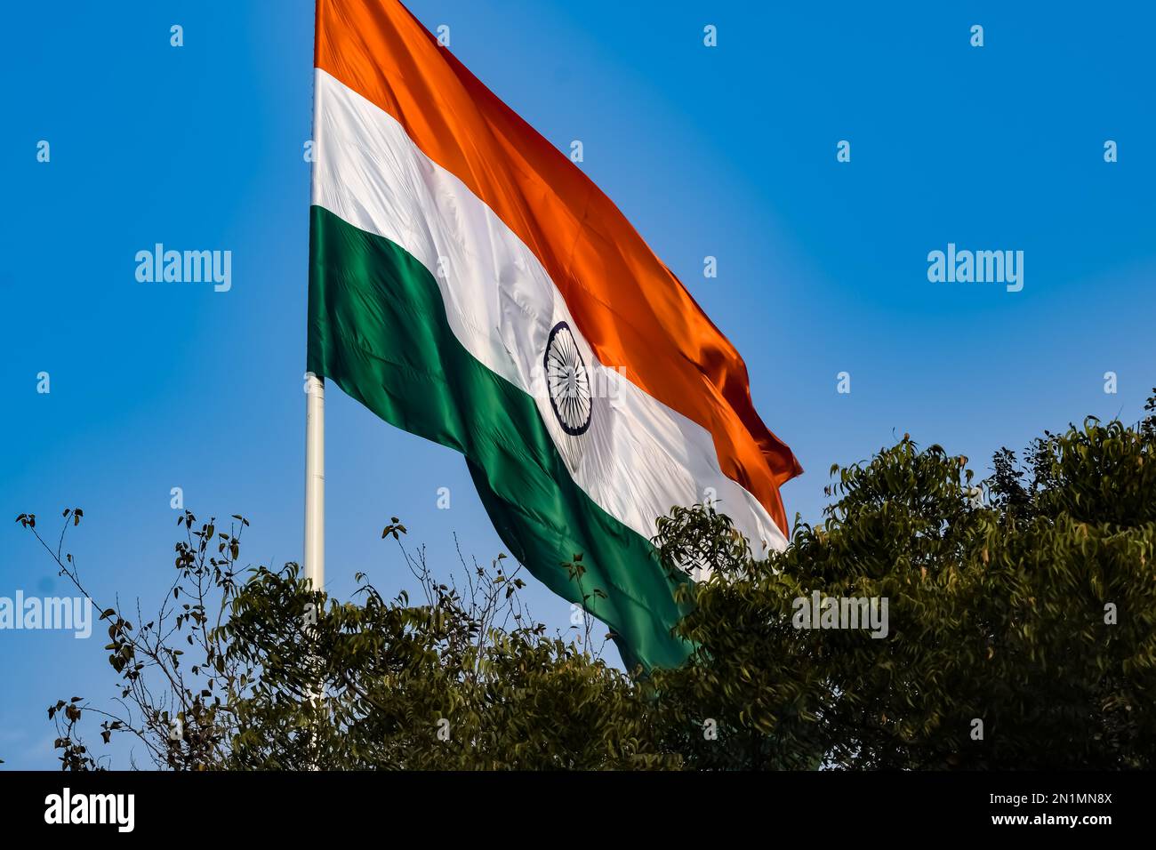 India flag flying high at Connaught Place with pride in blue sky, India ...