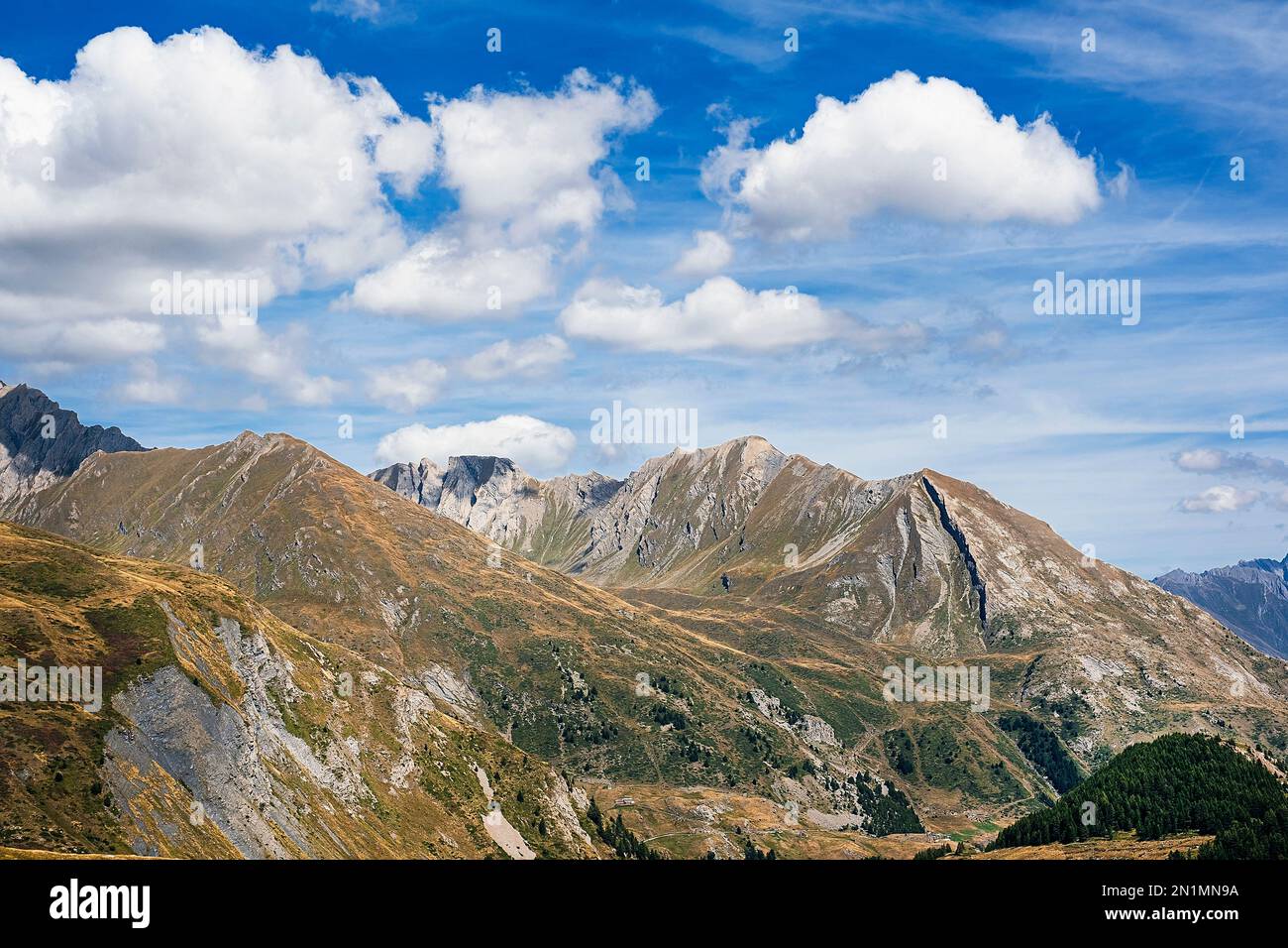Mountain rock landscape with clouds in the blue sky Stock Photo - Alamy