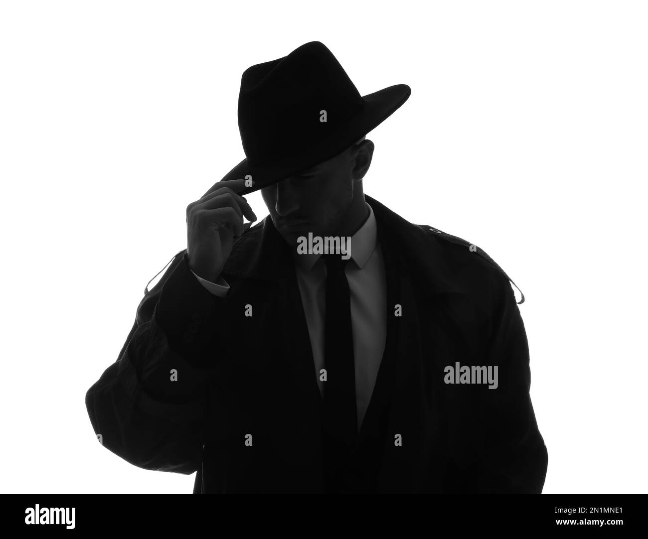 Old fashioned detective in hat on white background Stock Photo - Alamy