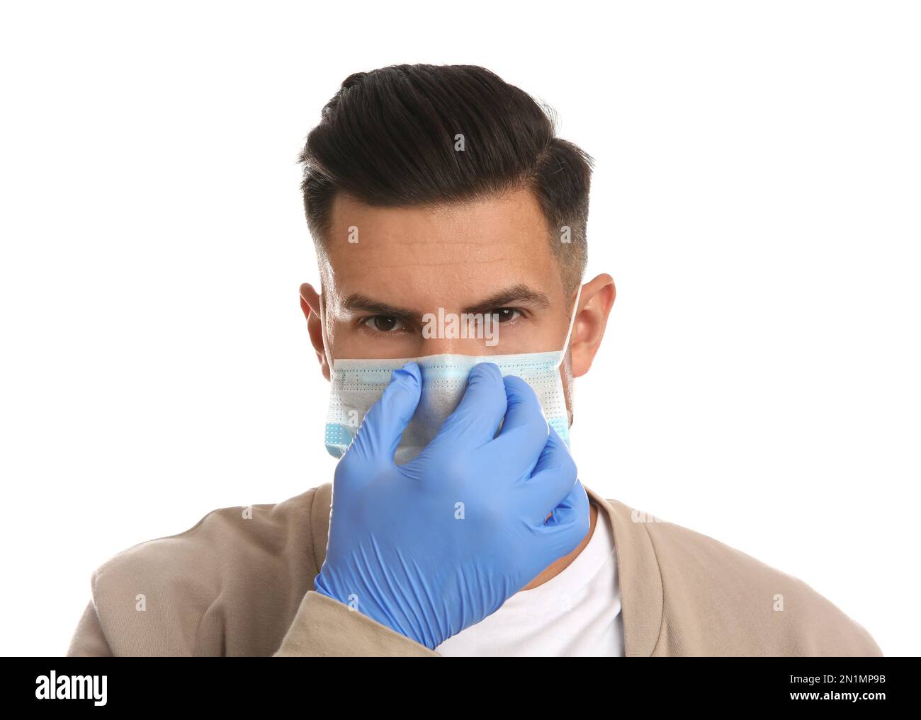 Person putting on respirator mask hi-res stock photography and images ...