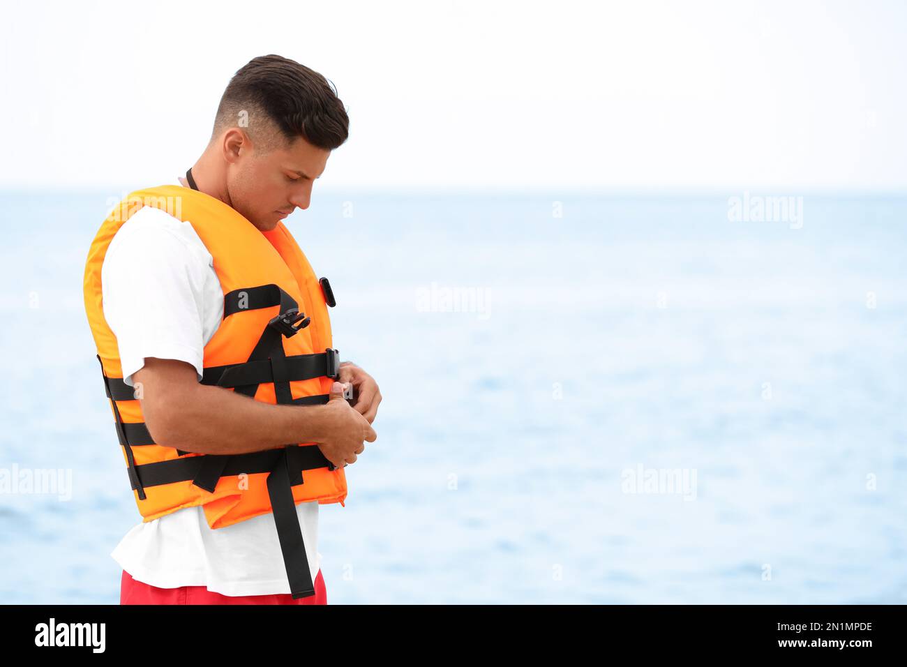 Handsome male lifeguard life hi-res stock photography and images - Alamy