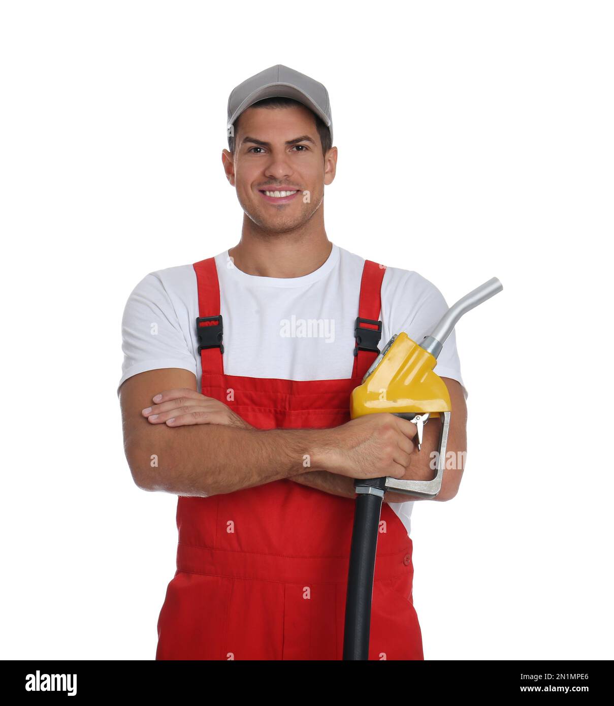 Gas station worker with fuel nozzle on white background Stock Photo - Alamy