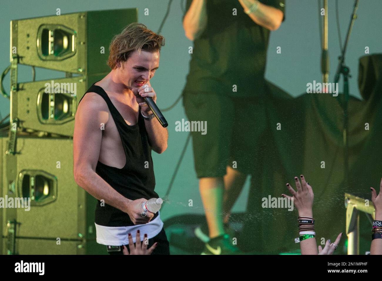 DJ Ryland performs on stage as an opener during R5's "Sometime Last ...