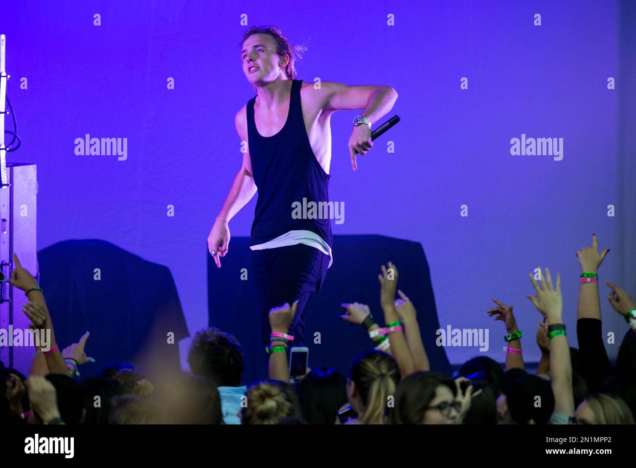 DJ Ryland performs on stage as an opener during R5's "Sometime Last ...