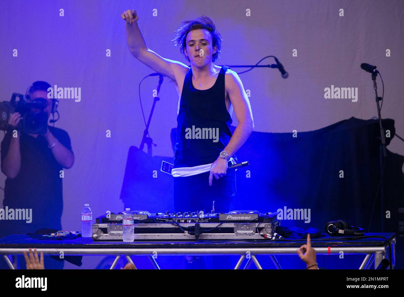 DJ Ryland performs on stage as an opener during R5's "Sometime Last ...