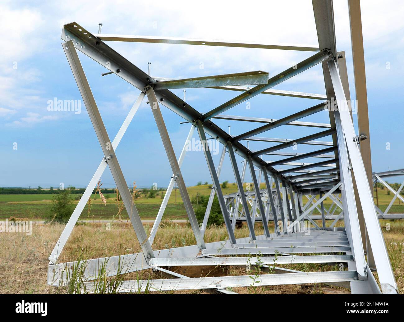 High voltage tower construction outdoors. Installation of electrical ...
