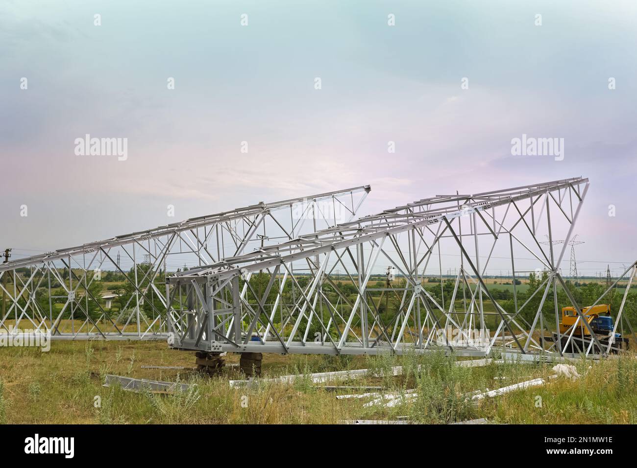 High voltage tower construction outdoors. Installation of electrical ...