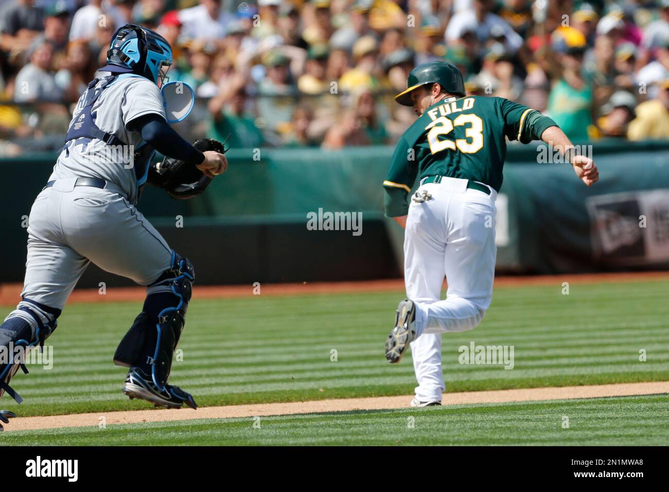 Tampa Bay Rays catcher Rene Rivera chases down Oakland Athletics' Sam ...