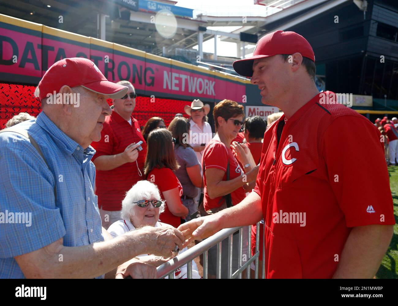 Cincinnati Reds right fielder Jay Bruce, right, talks to fans prior to ...