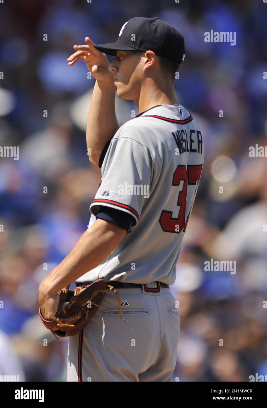Atlanta Braves' starting pitcher Matt Wisler (37) reacts after giving ...