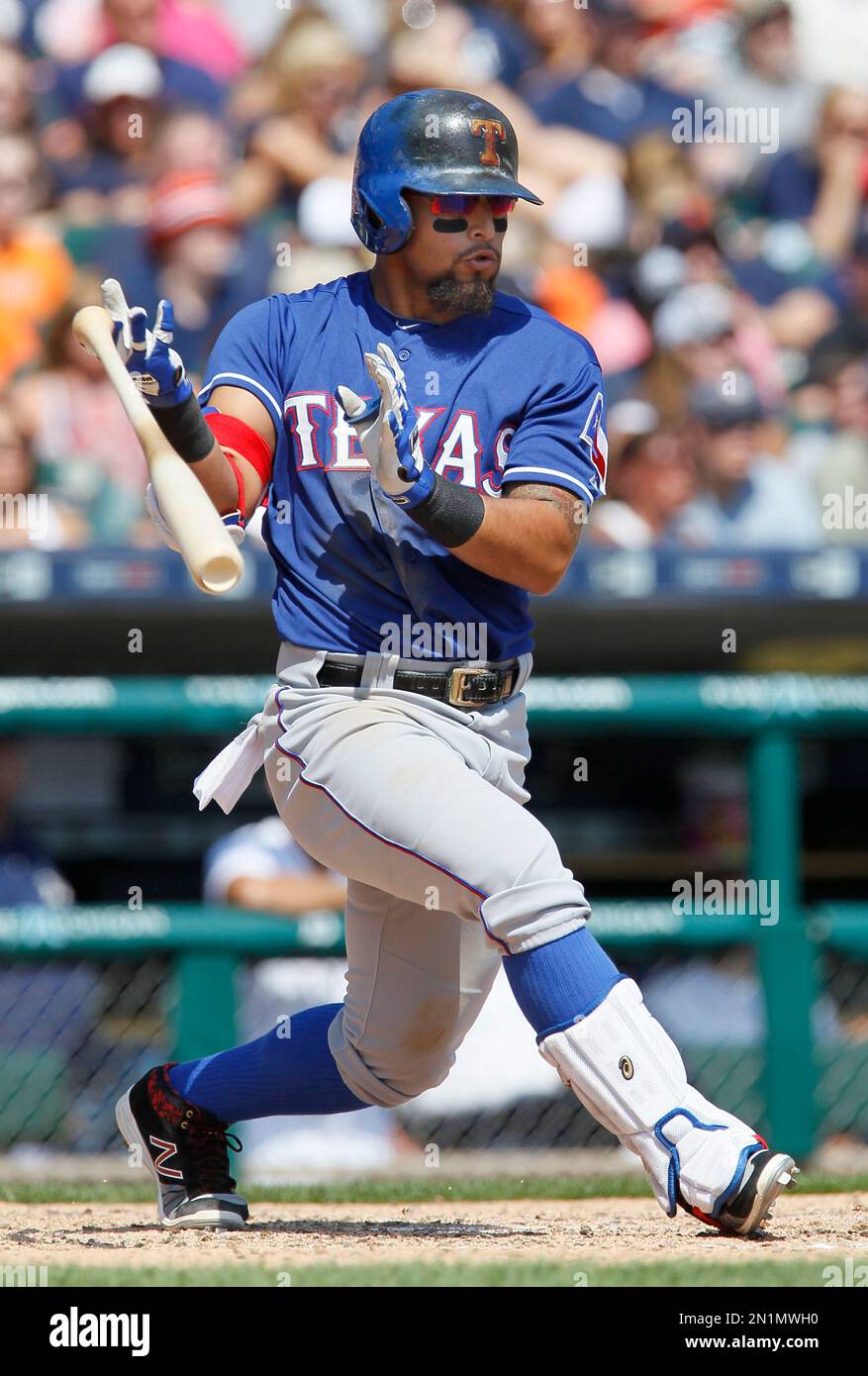 Texas Rangers' Rougned Odor flips his bat as he flies out during the ...