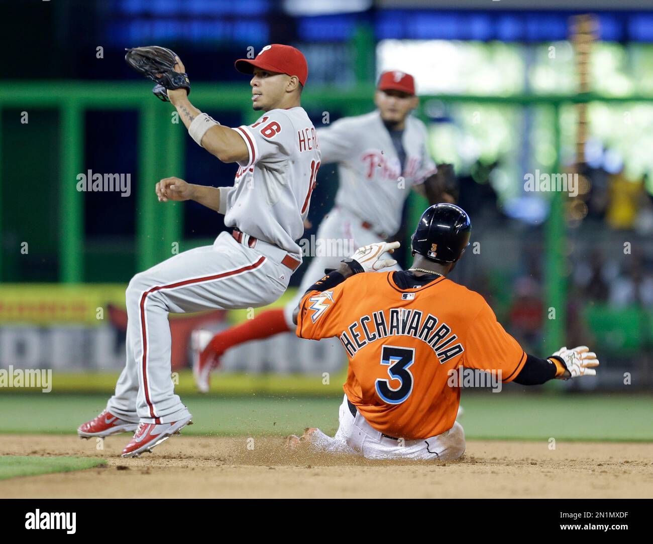 Miami Marlins' Adeiny Hechavarria (3) steals second base as ...