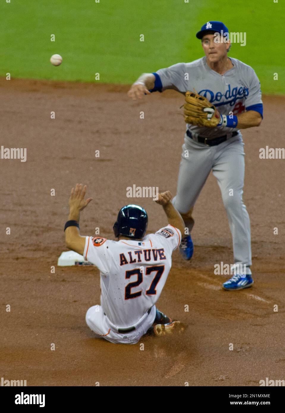 Los Angeles Dodgers second baseman Chase Utley makes the throw to first ...