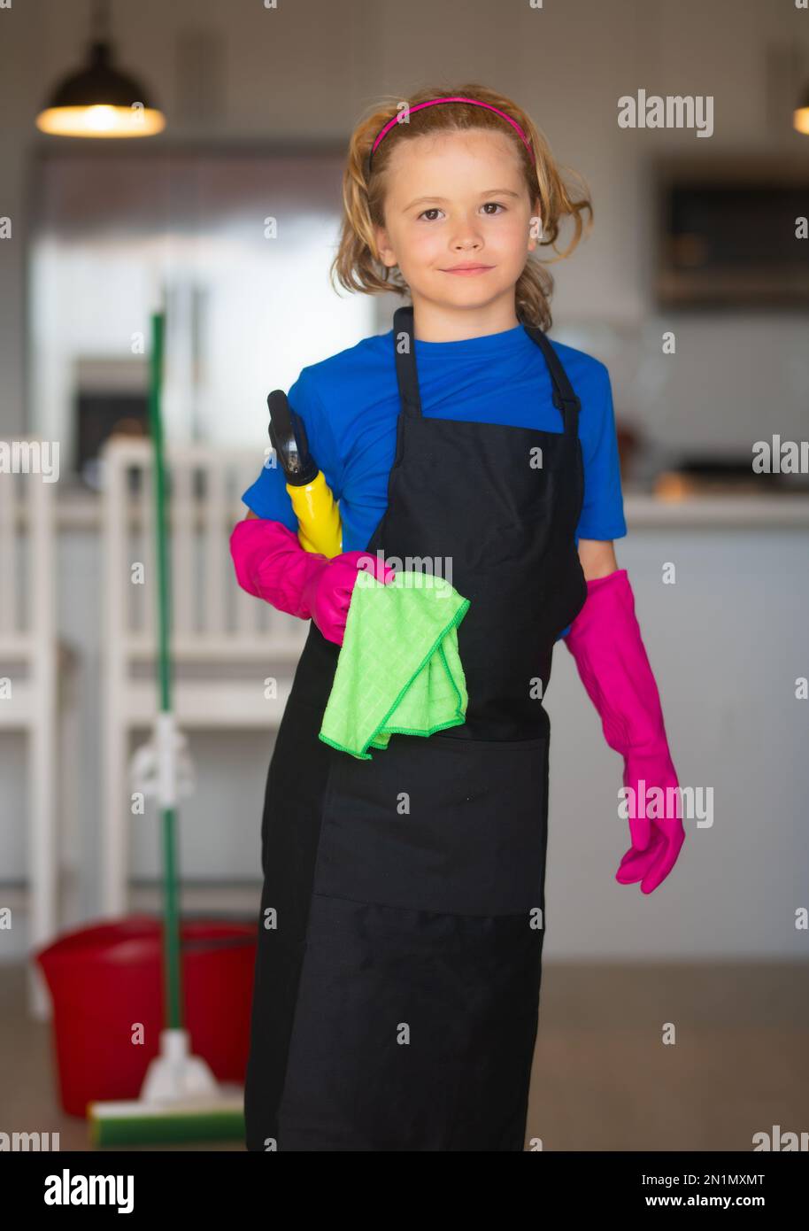 Children helping with housekeeping, cleaning the house. Housekeeping at ...