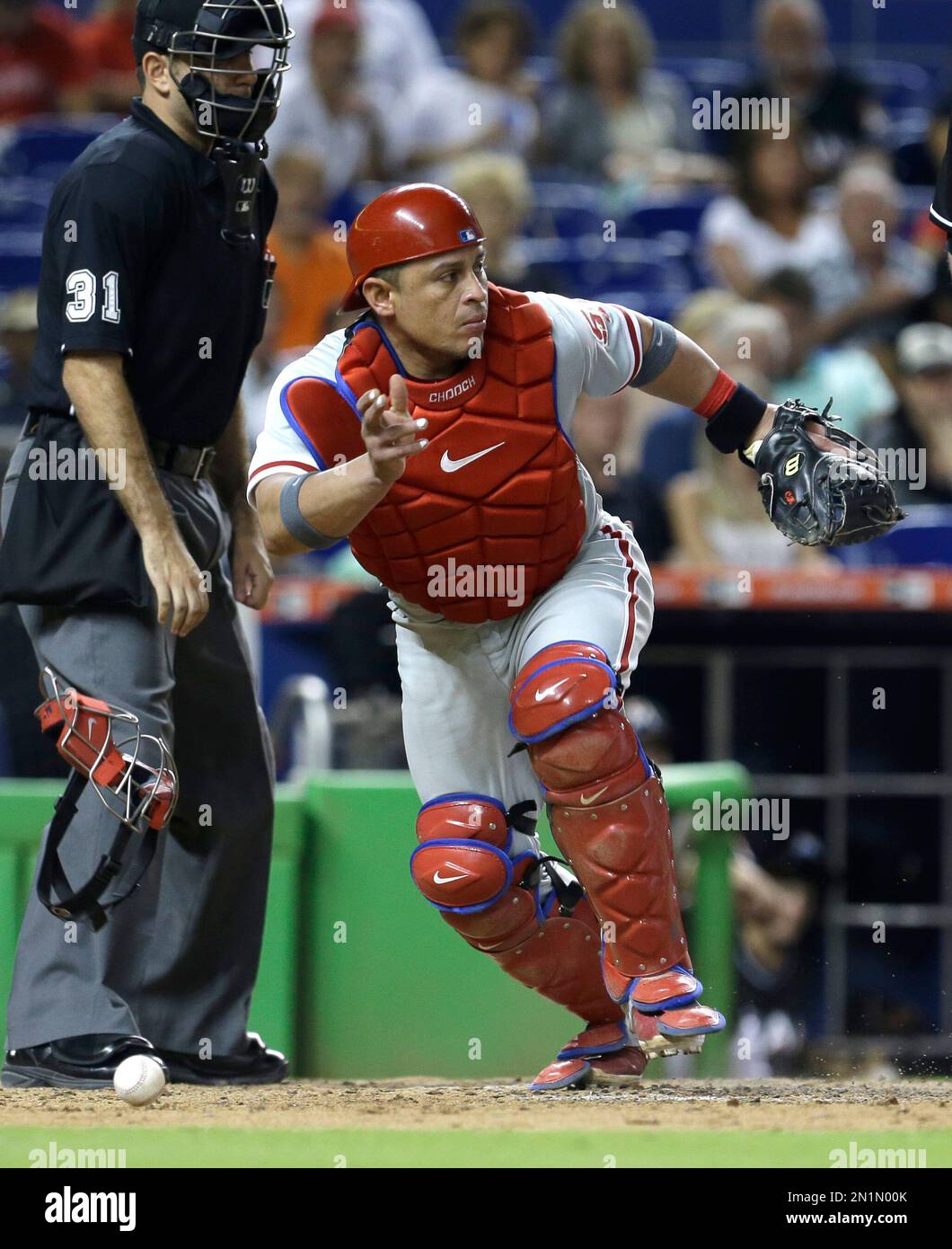 Philadelphia Phillies catcher Carlos Ruiz (51) goes after the ball ...