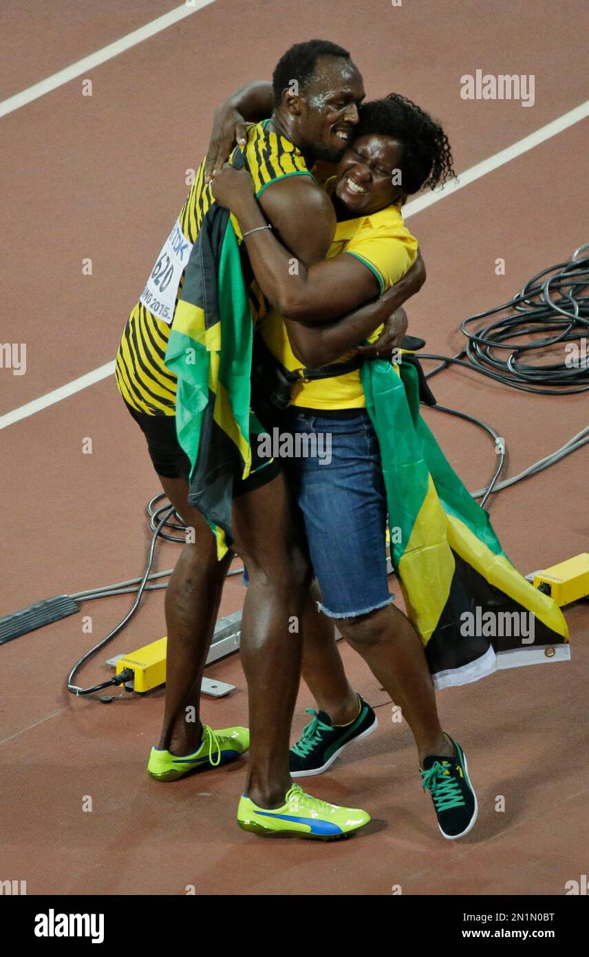 Jamaica's Usain Bolt hugs his mom, Jennifer Bolt, after Usain won the ...
