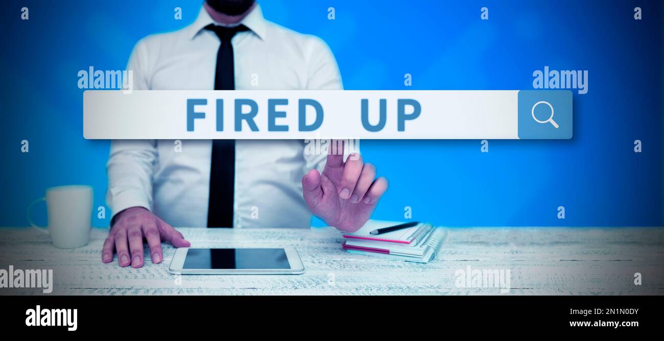 Sign displaying Fired Up, Word for means that someone energized and in ...