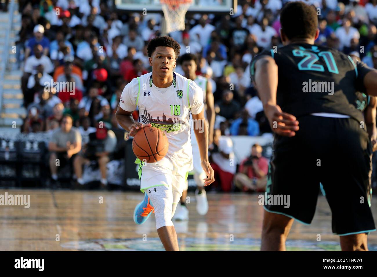 Team EZ Pass' Trevon Duval #10 in action against Team Doo Be Doo in the ...