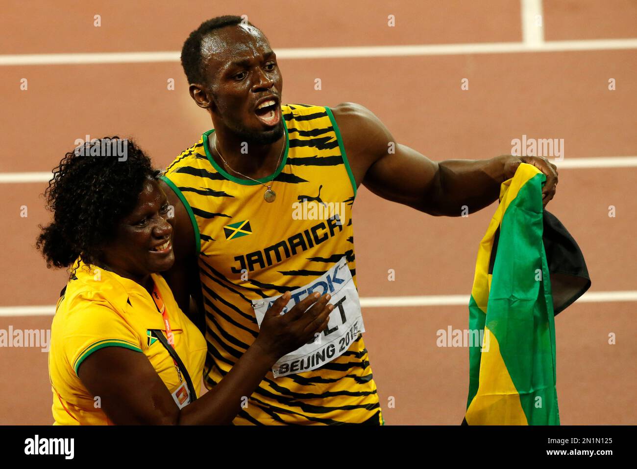 Jamaica's Usain Bolt celebrates with his mother Jennifer Bolt, left ...
