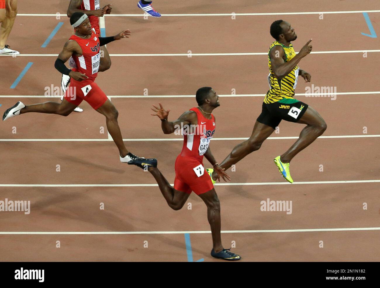 Jamaica's Usain Bolt, right, wins the gold medal in the men's 100m ...