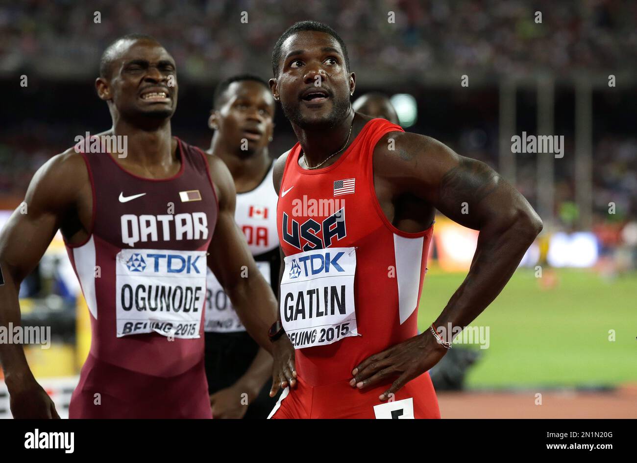 United States' Justin Gatlin looks up after running in a semifinal of ...