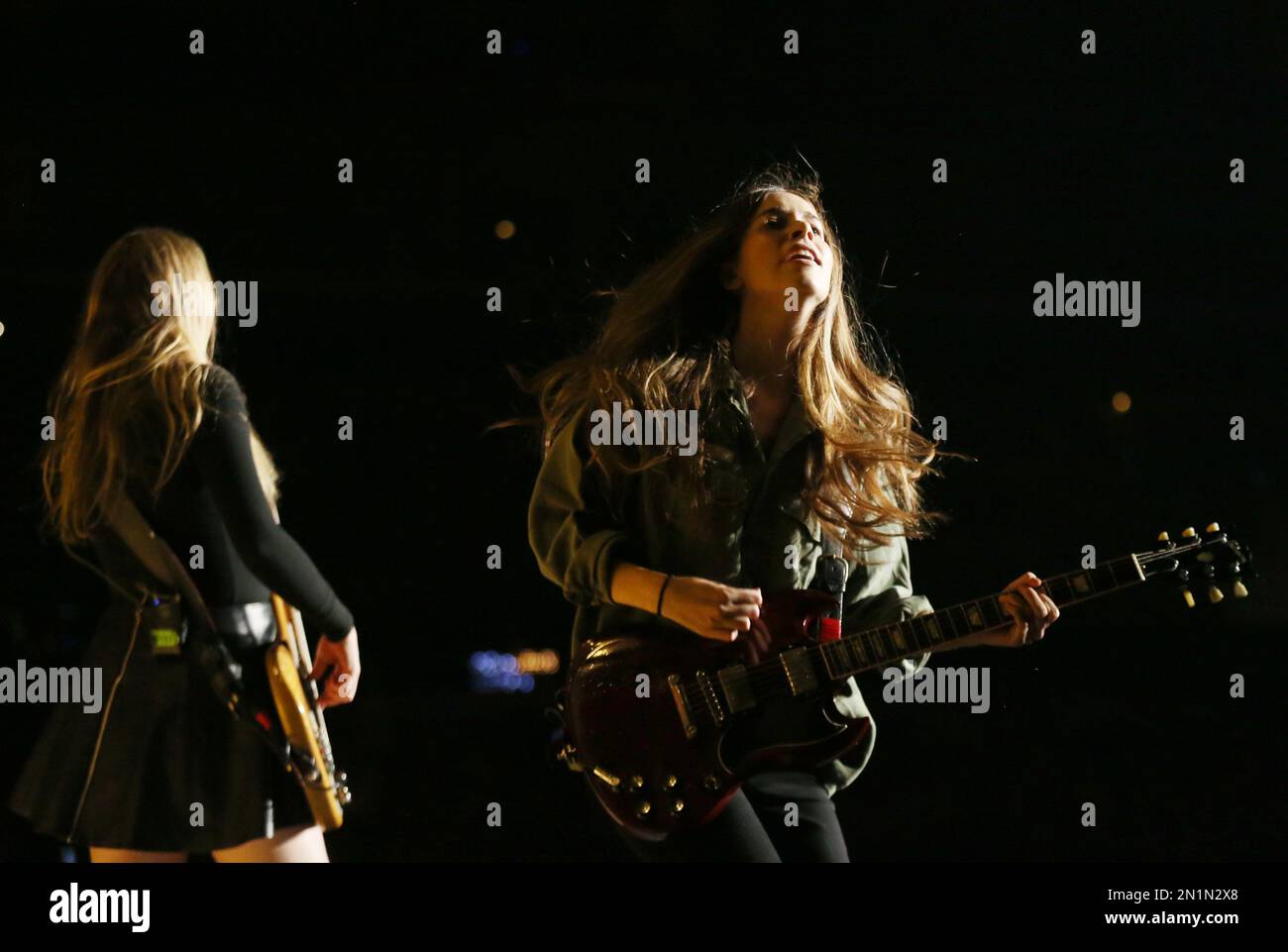 Danielle Haim, right, and Este Haim, from the band Haim, perform during ...
