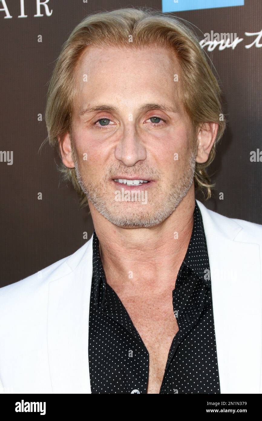 Fashion designer David Meister attends the Genlux OC Issue Release ...