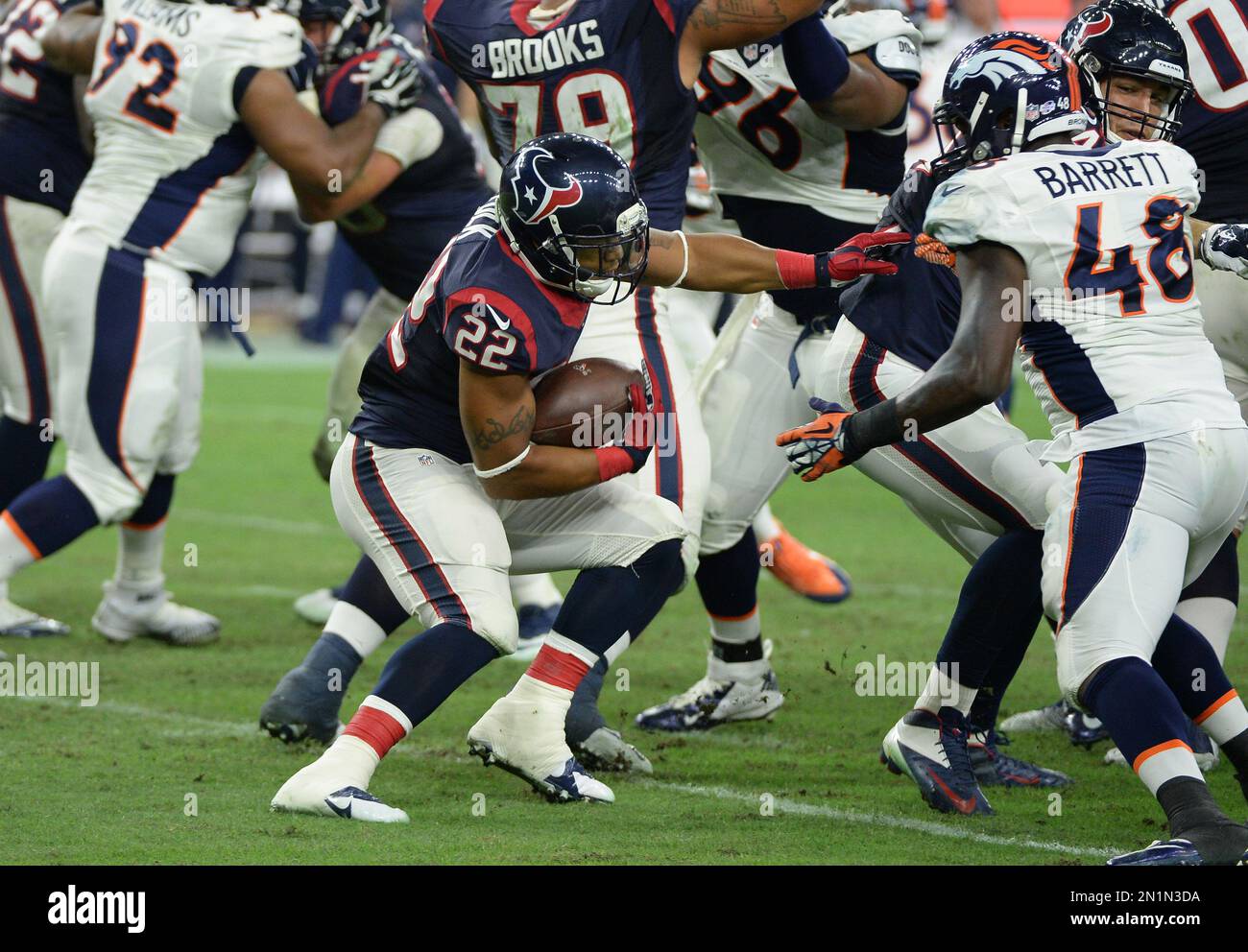 Houston Texans' Chris Polk (22) runs against the Denver Broncos during ...